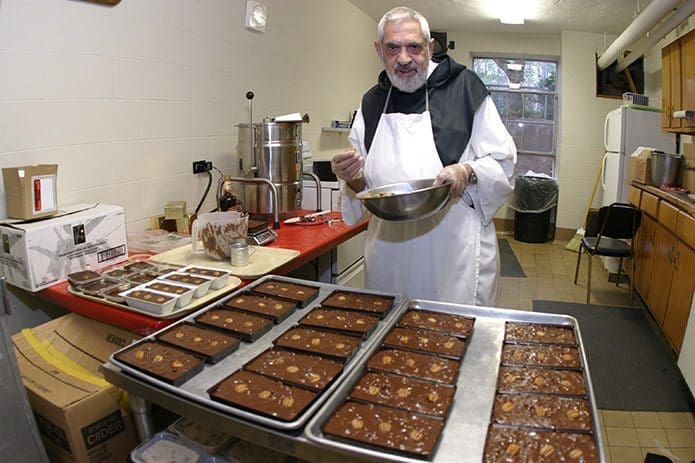 Father Anthony Delisi, ‘the one who invited people in,’ is laid to rest ...