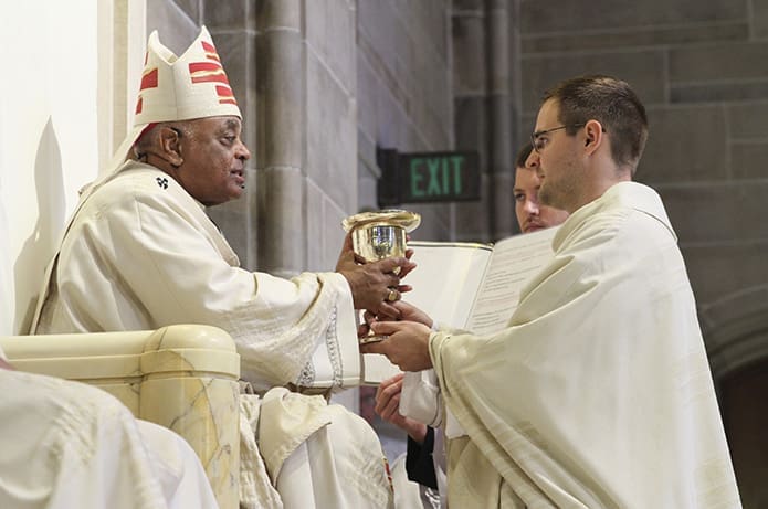 Five priests ordained to serve archdiocese - Georgia Bulletin - Georgia ...