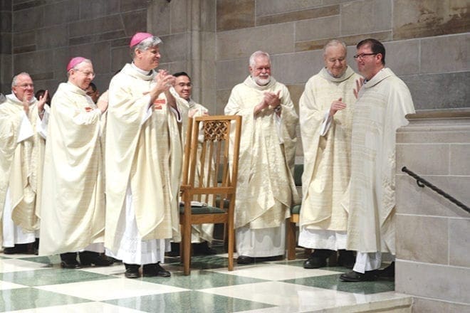 Former director bids farewell as new director of vocations takes over ...